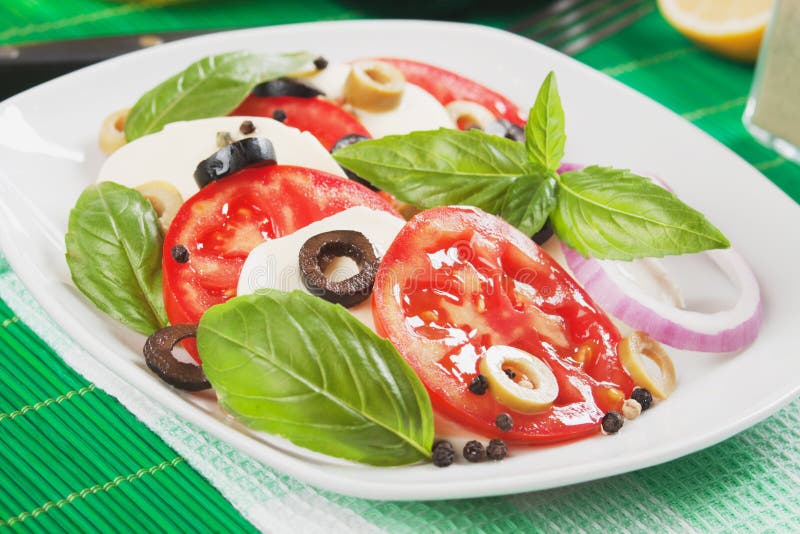 Italian Caprese Salad with Mozzarella Cheese and Tomatoes Stock Image ...