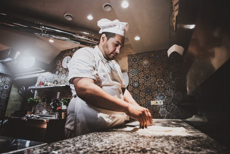 Chef is Making Pizza at the Restaurant Kitchen Stock Photo - Image of ...