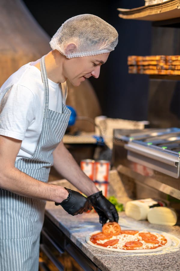 Italian Chief-cooker Baking Pizza in the Restaurant Stock Image - Image ...
