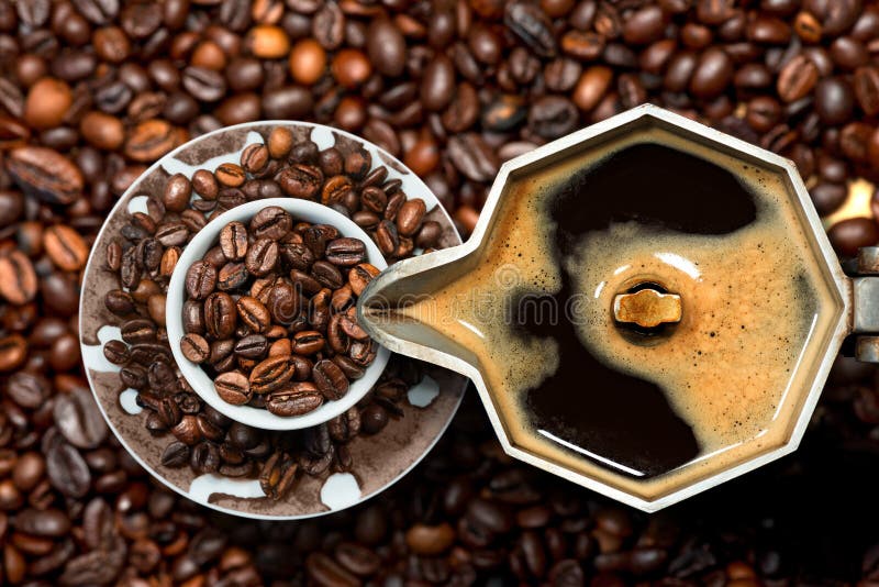 Italian Coffee Maker and Cup Full of Roasted Coffee Beans Stock Photo ...
