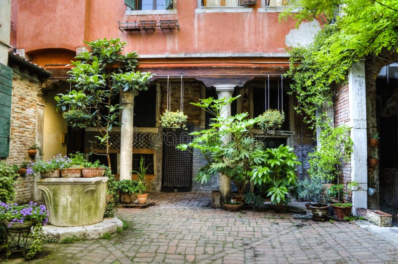 Italian Courtyard with Plants in Containers Stock Image - Image of ...