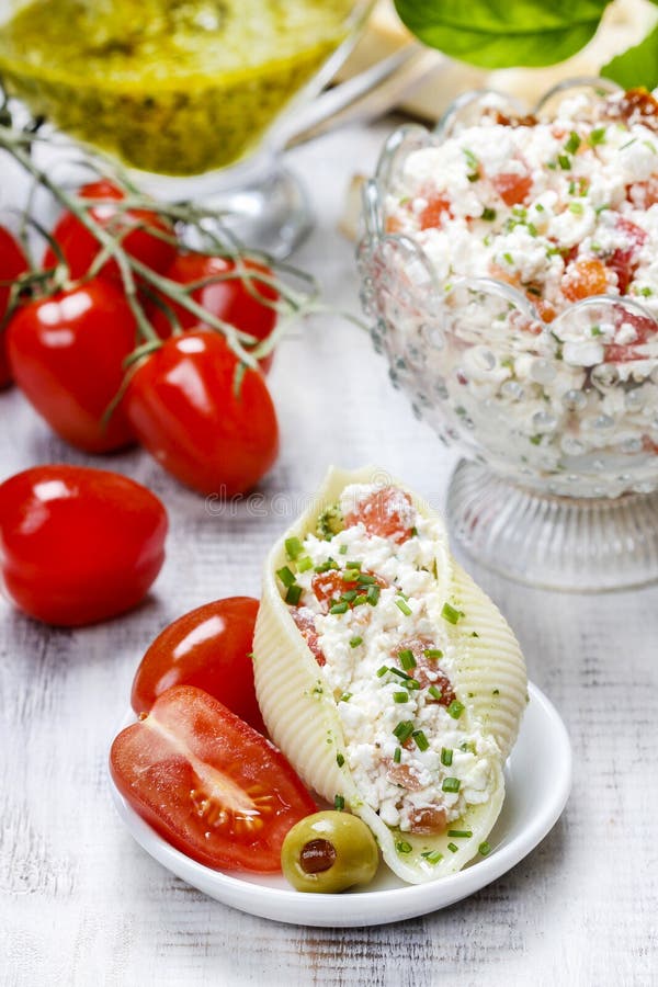 Italian Cuisine: Pasta Shells Stuffed with Cottage and Tomato Stock ...