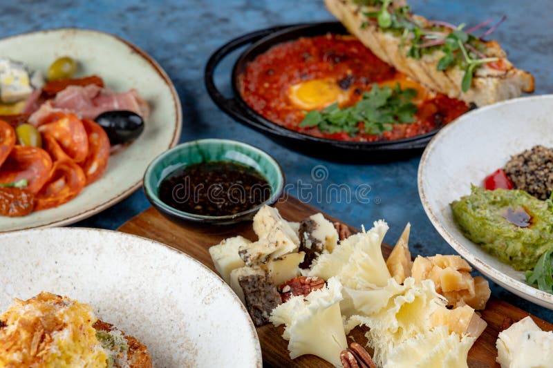 Table Served with Plates of Italian Dishes Stock Image - Image of plate ...