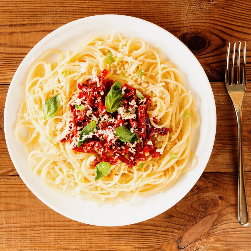 Italian Dish - Pasta with Sundried Tomato and Basil. Top View Stock ...