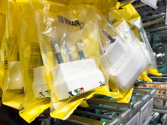 Italian Electrical Plug Adapters in Yellow Packaging on Shelf Editorial ...