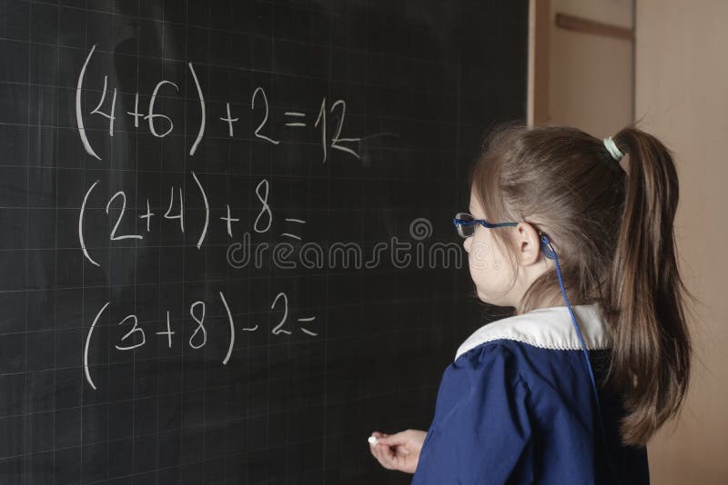 Italian Elementary School Girl First-grader Solve Mathematics Stock ...