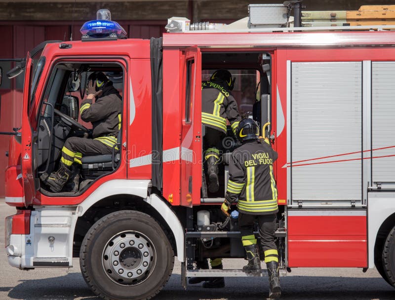 Italian Firefighters during Outdoor Exercise with a Ladder with Stock ...