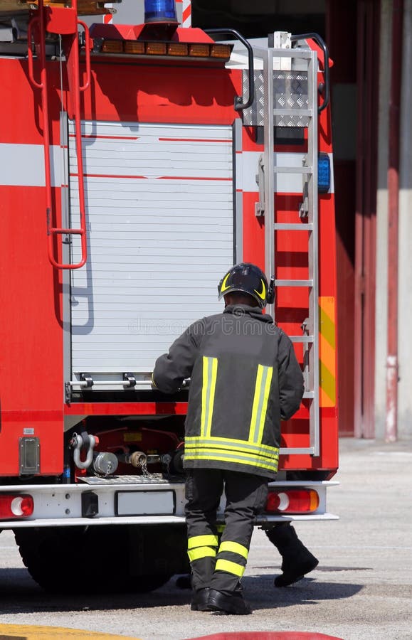 Italian Fireman with Protective Uniform Stock Photo - Image of fighting ...