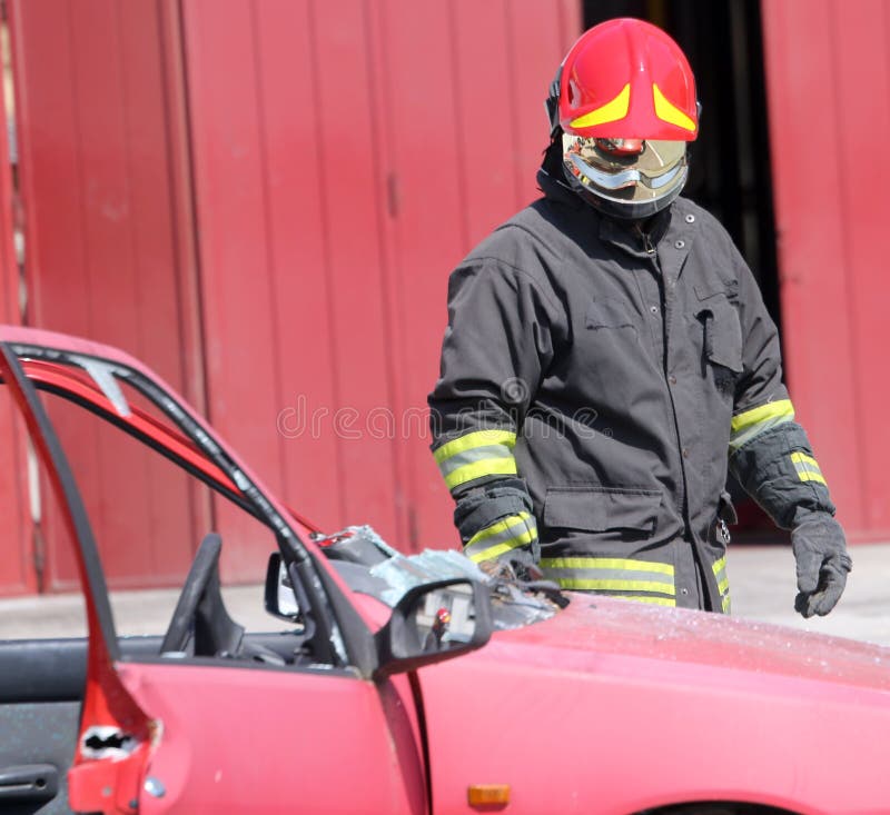 Italian Fireman with Protective Uniform and Red Helmet Stock Image ...