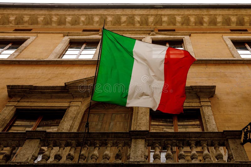 Italian Flag on the Old Building Balcony in the Old Town. Bottom View ...