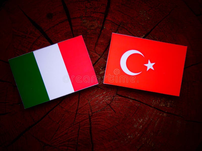 Italian Flag with Turkish Flag on a Tree Stump Stock Photo - Image of ...