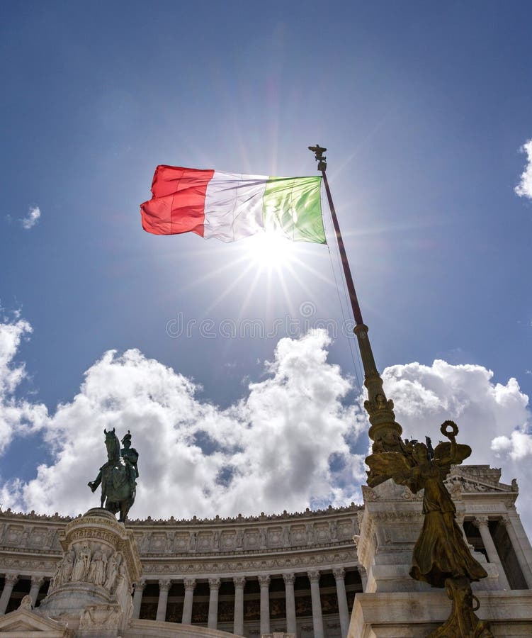 The Italian Flag Waving in the Wind in Front of Vittoriano Monument ...