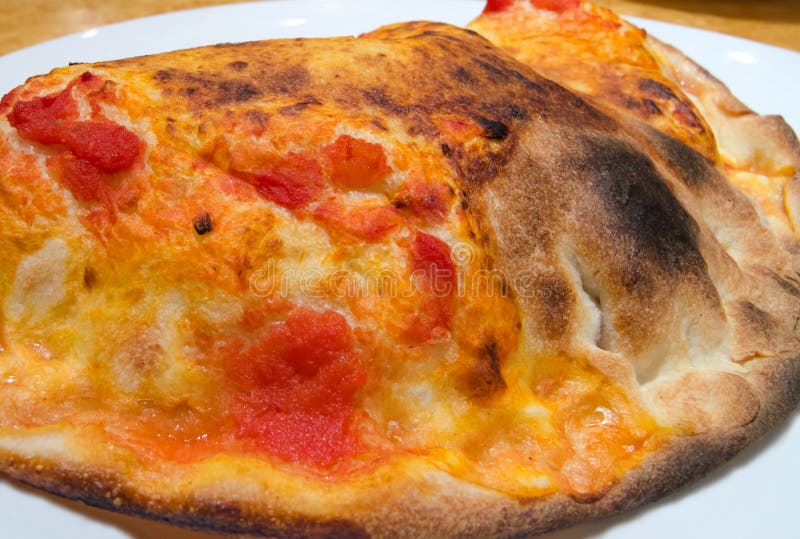 Italian Folded Pizza stock photo. Image of cuisine, tomato - 31379420