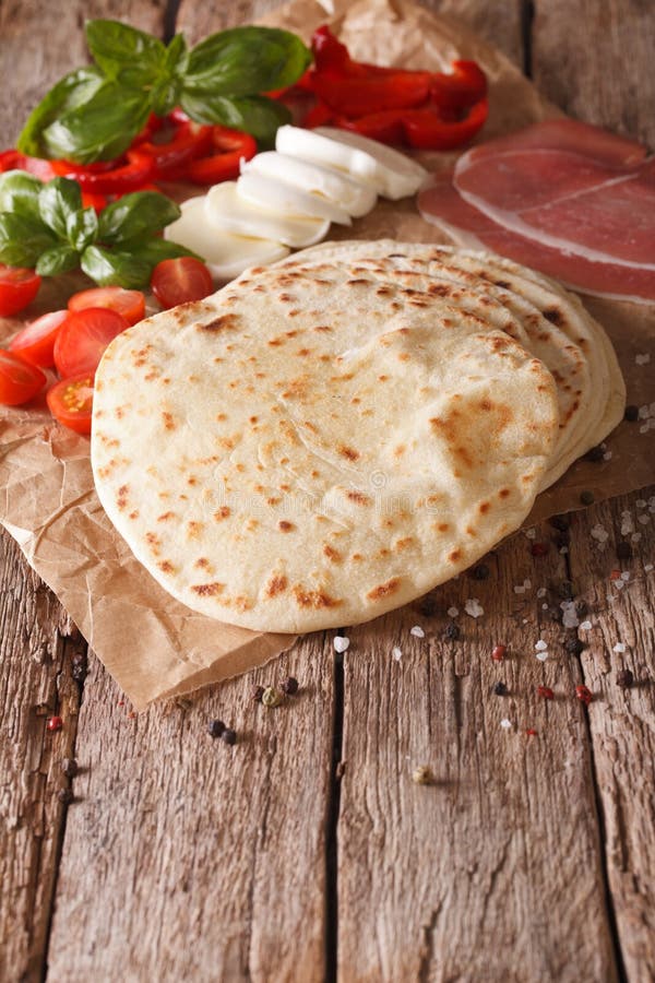 Italian Freshly Baked Flat Bread Piadina Close-up. Vertical Stock Photo ...