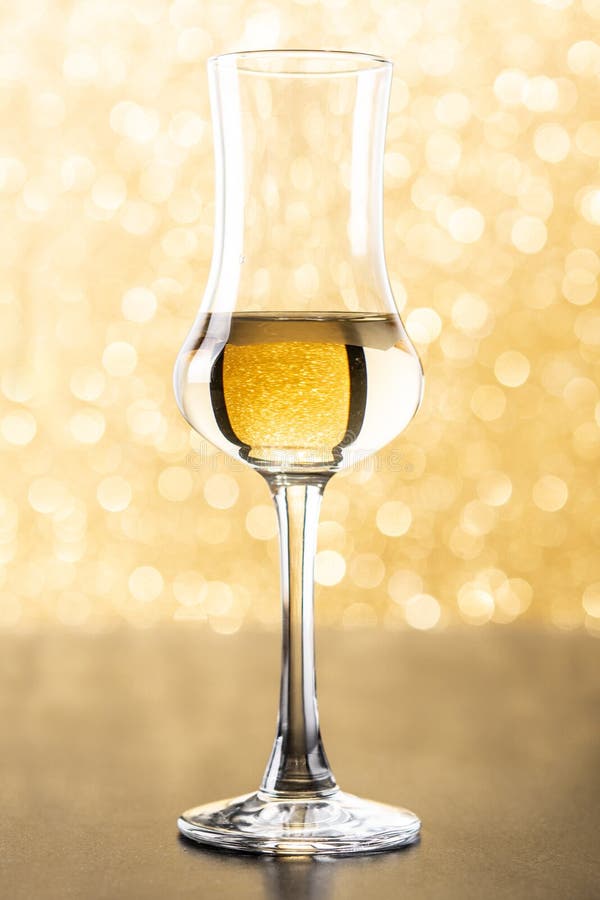 Italian Golden Grappa Drink Stock Photo - Image of traditional, glass ...