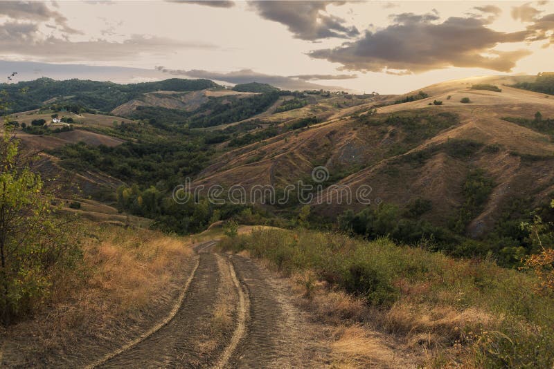 Italian hills at sunset stock image. Image of land, countryside - 86219245