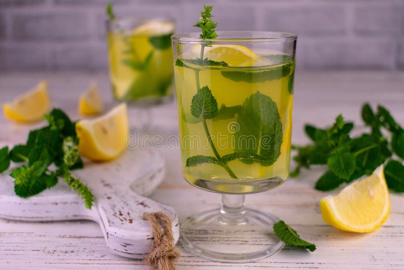 Italian Lemon Liqueur Limoncellos with Mint.Close-up. Stock Image ...