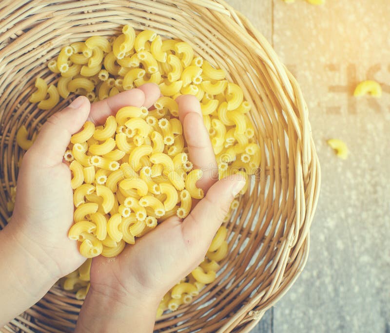 Italian Macaroni Pasta in Child Hand. Stock Photo - Image of italian ...