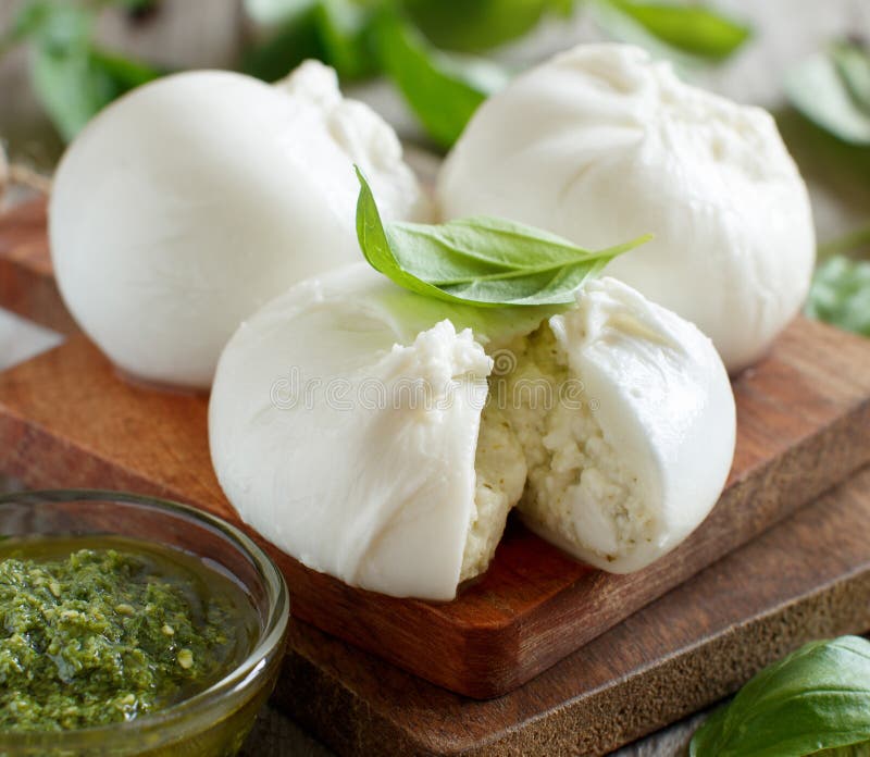 Italian Mozzarella Cheese Stuffed with Ricotta and Persto Stock Photo ...