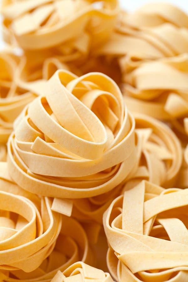 Italian pasta fettuccini stock image. Image of collection - 24058045