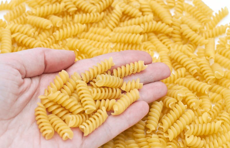 Italian pasta in hand stock photo. Image of eating, culture - 17995224