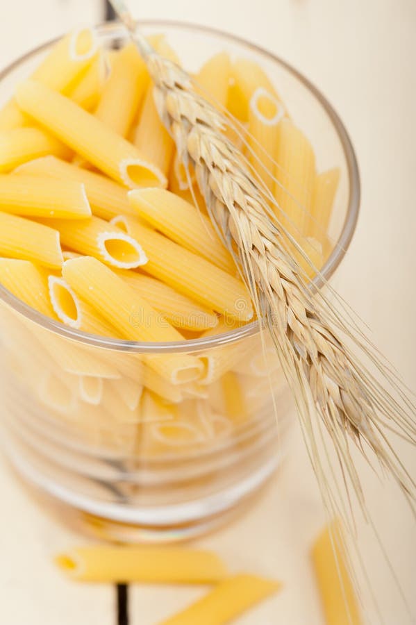 Italian Pasta Penne with Wheat Stock Image - Image of short, penne ...