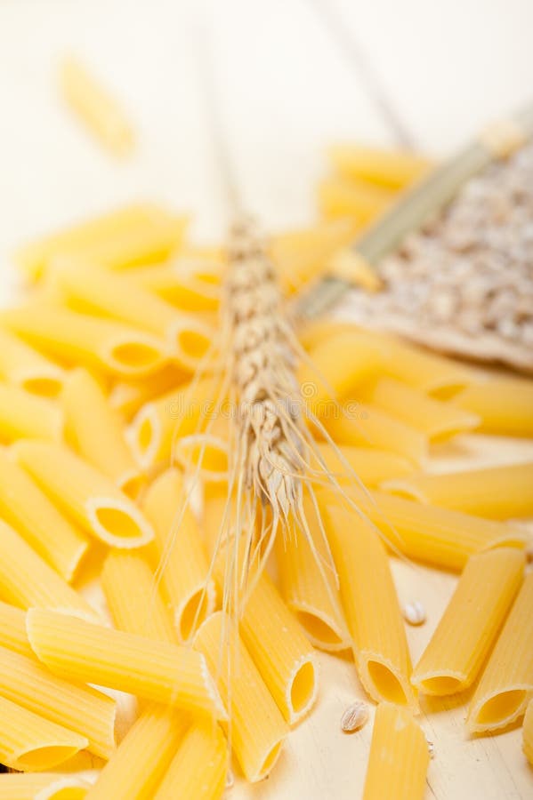 Italian Pasta Penne with Wheat Stock Photo - Image of short, italian ...