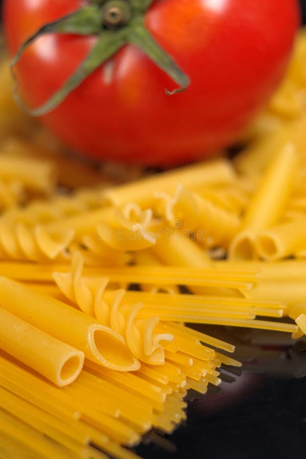 Italian Pasta Selection and Tomato Over Black Stock Photo - Image of ...