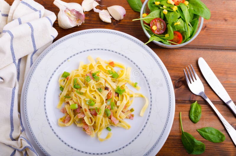 Italian Pasta with Spring Onion and Bacon Stock Photo - Image of ...
