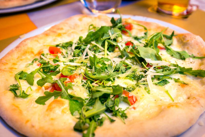 Italian pizza with rucola stock image. Image of ingredients - 58275573