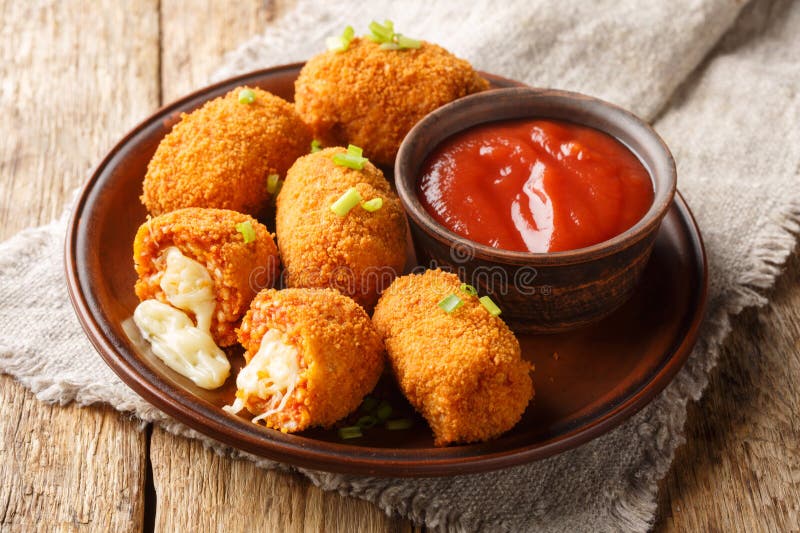 Italian Rice Balls Stuffed with Mozzarella Cheese and Deep Fried ...