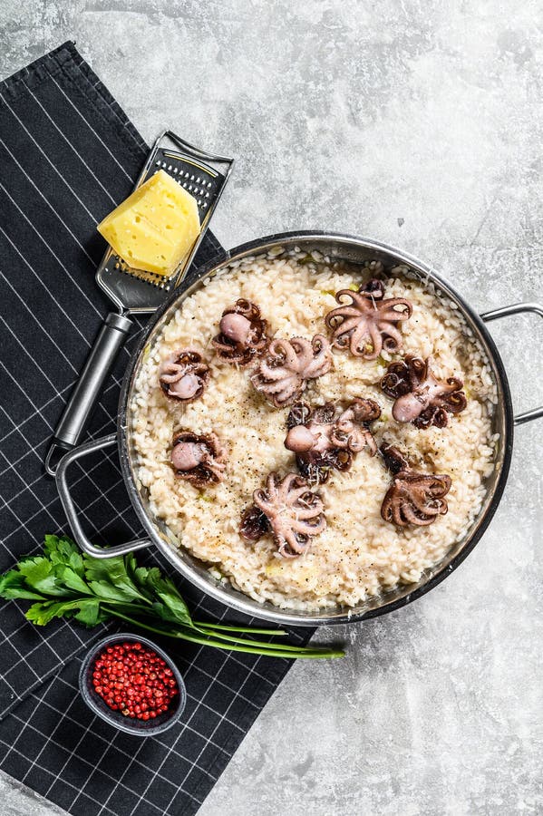 Italian Risotto with Octopus and Mushrooms. Gray Background. Top View ...