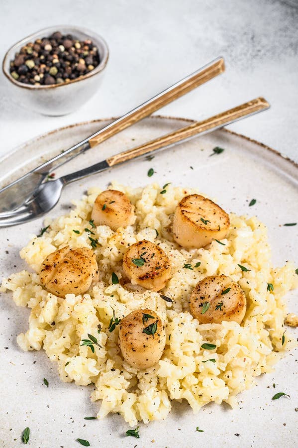 Italian Risotto with Pan Seared Sea Scallops. White Background Stock ...