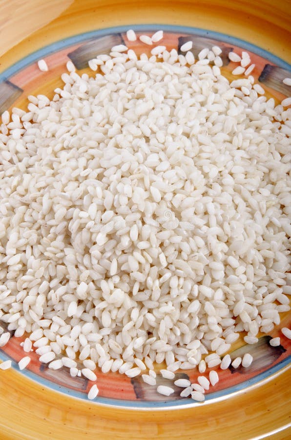 Italian Risotto Rice on a Plate Stock Photo - Image of rice, uncooked ...