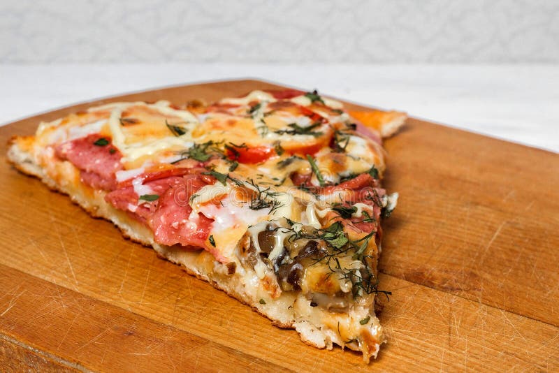 Italian Rustic Pizza, One Piece on a Wooden Tray, White Wooden Table ...