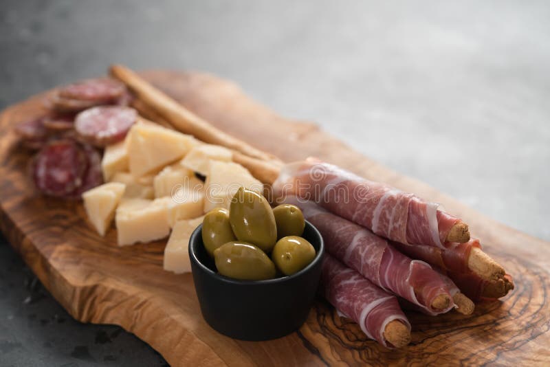 Italian Snacks on Olive Wood Board Stock Photo - Image of cheese, bacon ...
