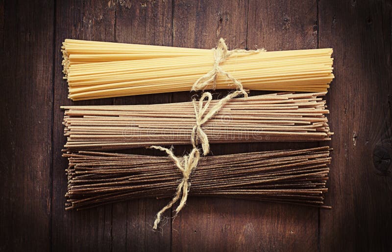 Italian Spaghetti on the Old Wooden Table Stock Image - Image of ...
