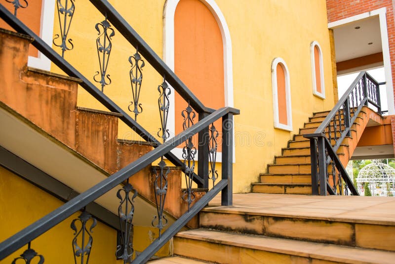 Italian Style Orange Building and Staircase Stock Image - Image of ...