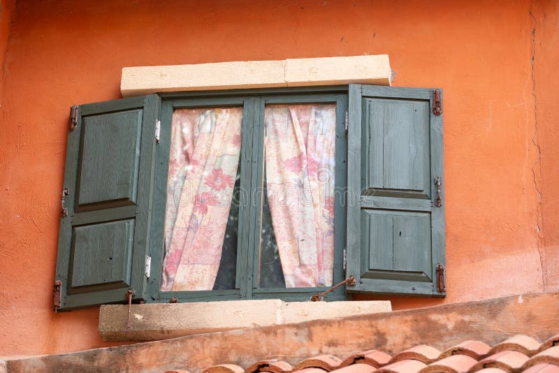 Italian Style Wooden Windows on the Orange Wall Stock Photo - Image of ...
