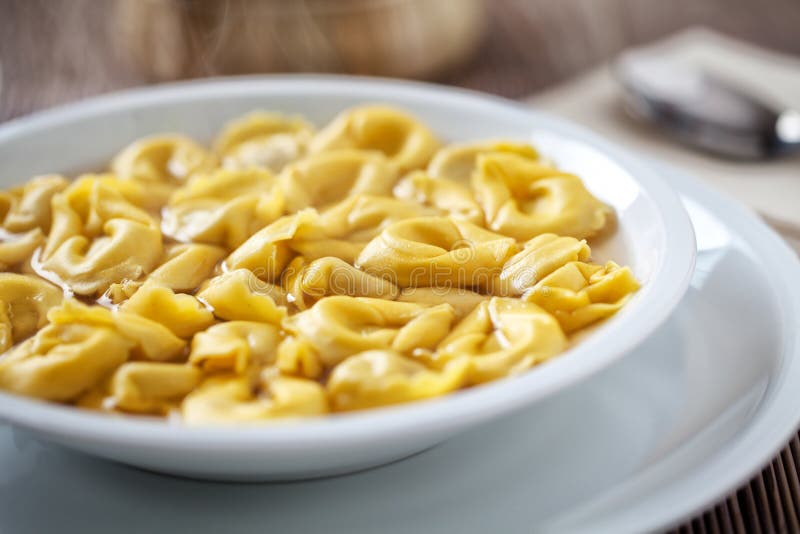 Italian Tortellini in Broth on a Plate. Stock Image - Image of broth ...