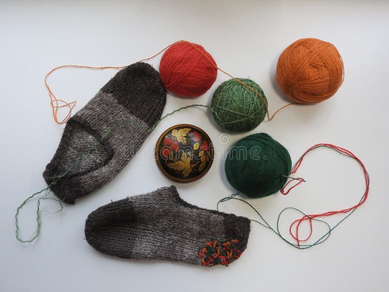Items and Colored Balls of Darning Thread, Laid Out on a White ...