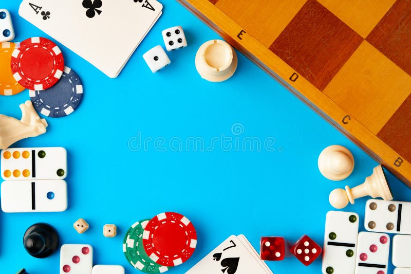 Items for Playing Chess, Poker and Domino on Blue Background Studio ...