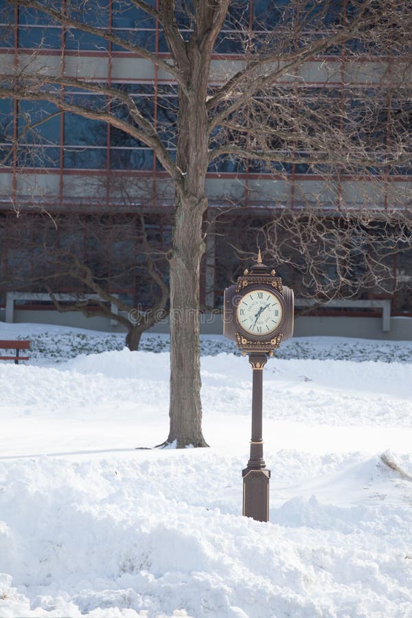 Ithaca College Clock after the Snowstorm Stock Image - Image of ...