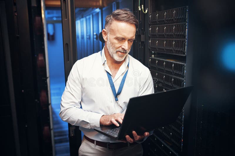 Itll Be Fixed in a Few Seconds. a Mature Man Using a Laptop while ...