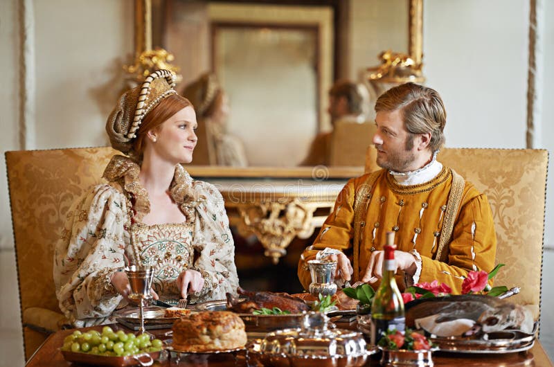 Its an Ample Feast. Shot of a Noble Couple Eating Together. Stock Photo ...