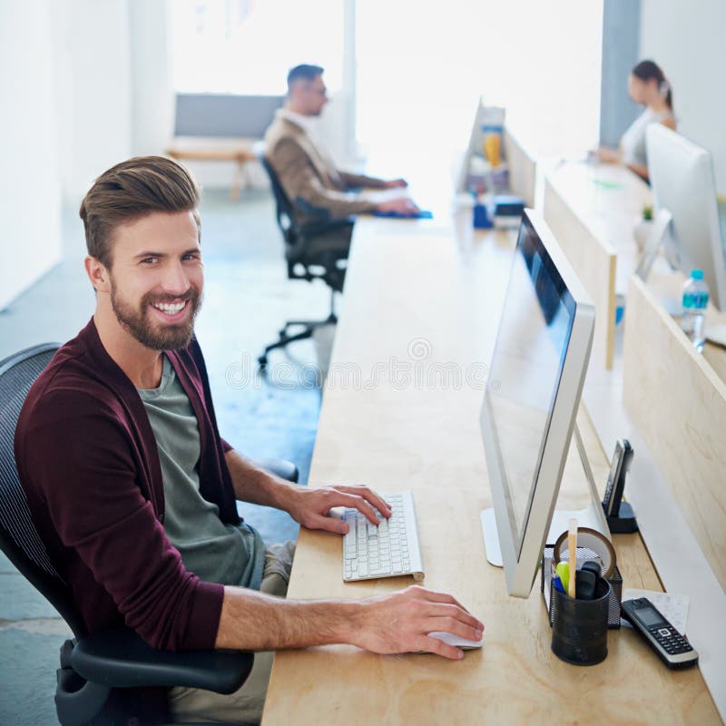 Its an Awesome Work Environment. a Designer at Work in an Office. Stock ...