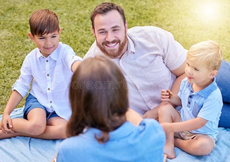 Its Bonding Time. a Young Family Spending a Day at the Park. Stock ...