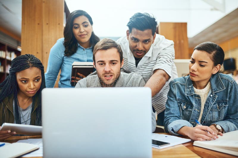 Its Easier in a Study Group. a Group of University Students Studying in ...