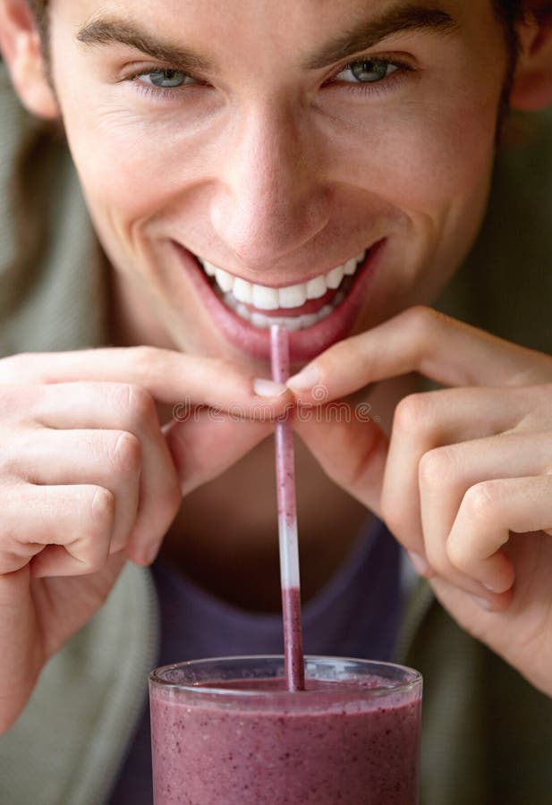 Its Easy To Eat Healthy. a Young Man Drinking a Cold Beverage. Stock ...