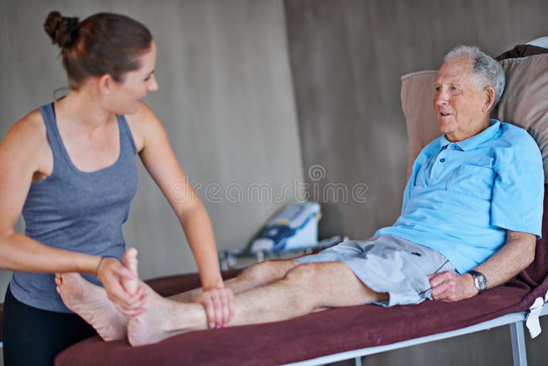 Its Feeling Much Better. an Elderly Man Having a Physiotherapy Session ...